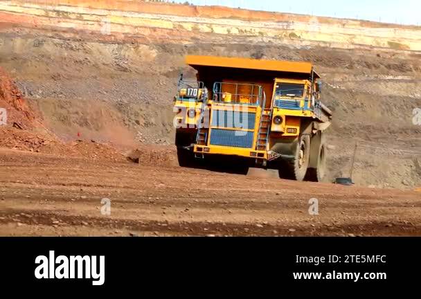 The modern quarry truck drives through the quarry. Visualization of the ...