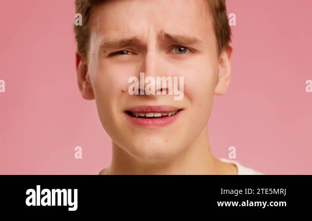 Frustrated Millennial Guy Crying Looking At Camera Over Pink Background ...