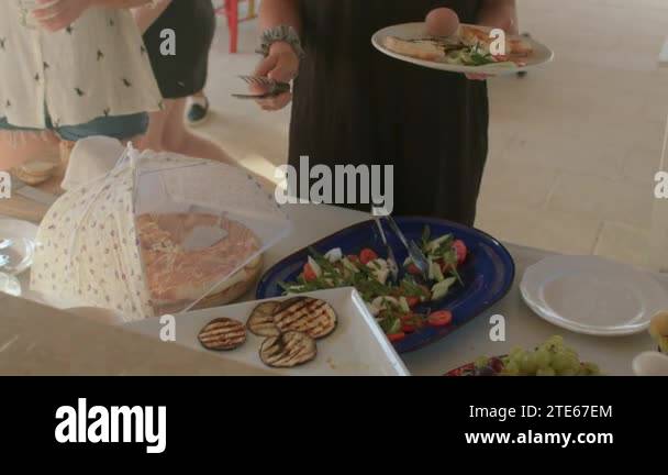 Hands put food plate breakfast. Using food application tool. Table with ...