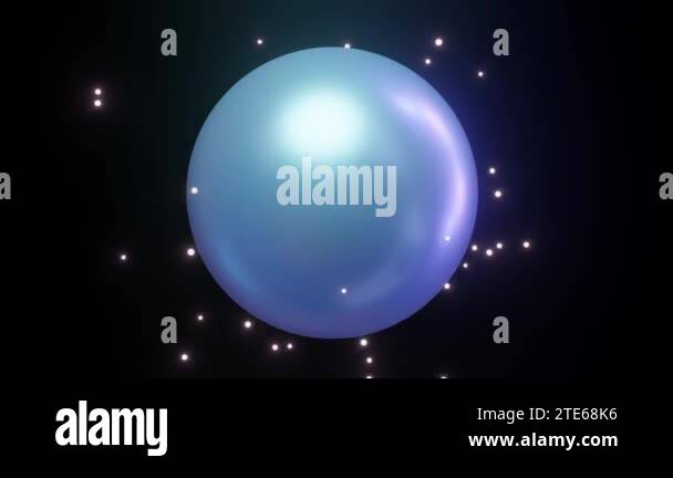 Abstract toy - a metal ball emits colored light particles, from a ...