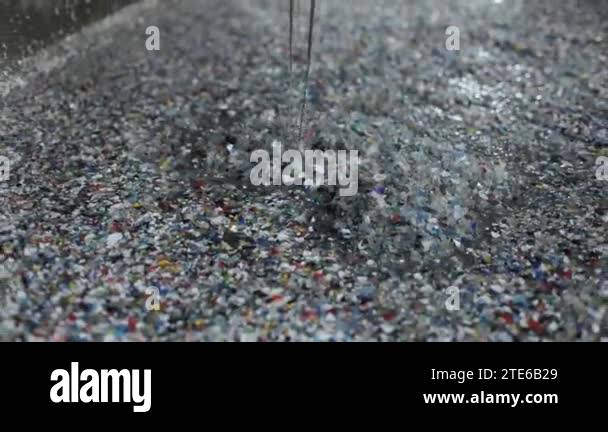 Recycling plastic by dissolving in a metal container. A large amount of ...