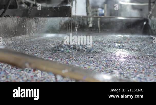 Recycling plastic by dissolving in a metal container using hot steam. A ...