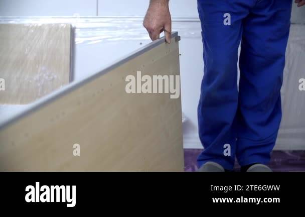 Man assembling new furniture Stock Videos & Footage - HD and 4K Video ...