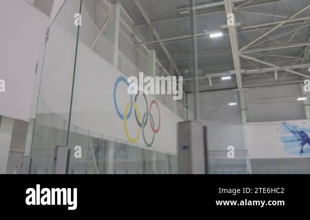 Olympic rings decor and ice rink at modern sports center Stock Video ...