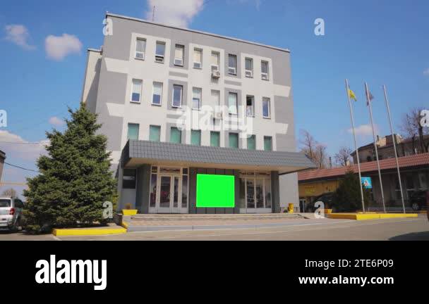 Office building with green screen. advertising banner green screen. An ...