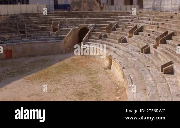 Construction of oval amphitheatre in Italy. Building with rising tiers ...
