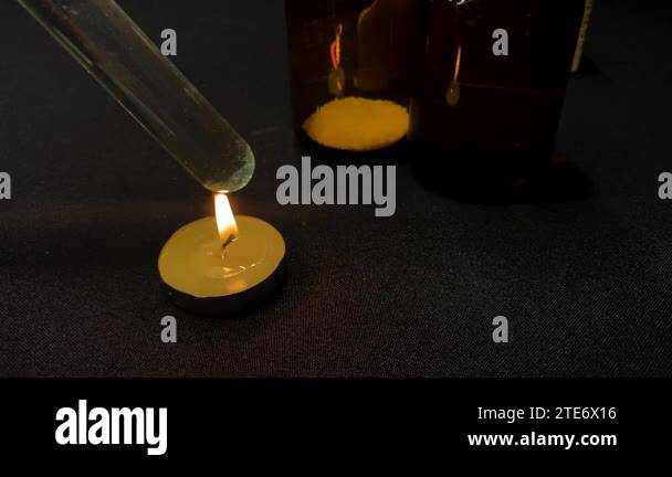 Lab footage, experiments with blue reagents, heating test tubes and ...