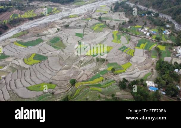 An aerial view of the terraced fields on a hillside farming community ...
