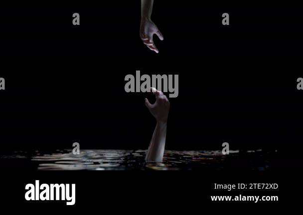 Drowning arm helping hand reaching out and connect Stock Video Footage ...
