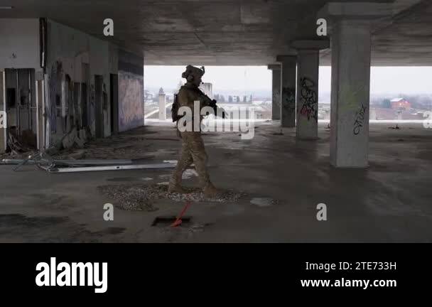 Special forces operator wearing Multicam uniform and his assault rifle ...