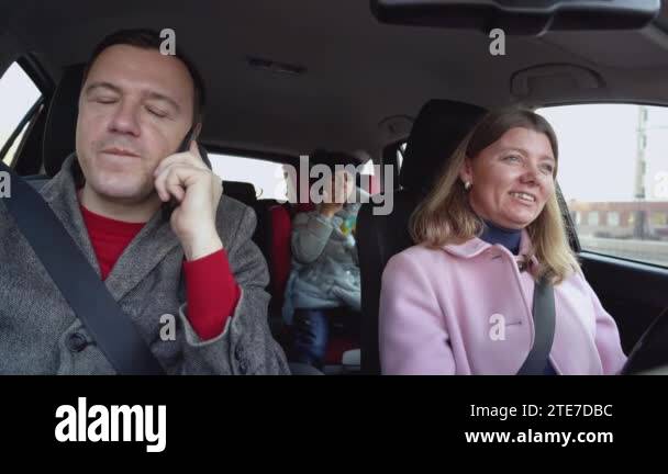 Happily driving car Stock Videos & Footage - HD and 4K Video Clips - Alamy