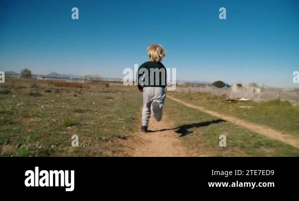 Child running across road Stock Videos & Footage - HD and 4K Video ...