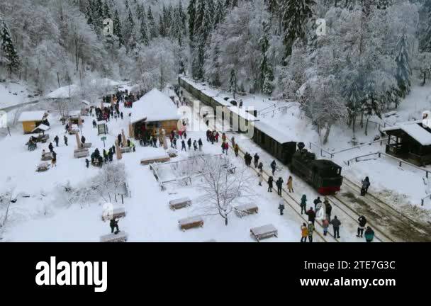 Footage of a vintage steam train stopping in the train station. Video ...