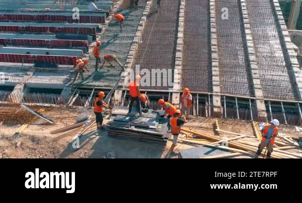 Construction process of a modern football stadium. Builders make ...