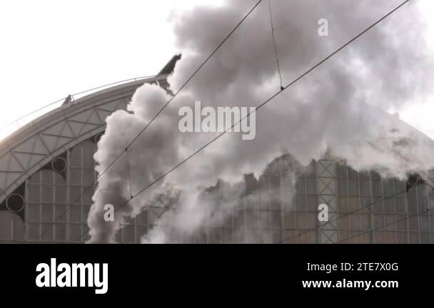 Steam pipe of steam locomotive of railway. Factory pipe of steam ...