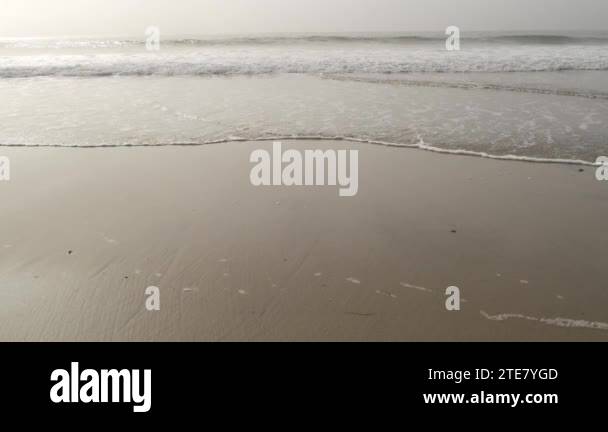 Sandy misty beach California USA. Pacific ocean coast, dense fog on sea ...