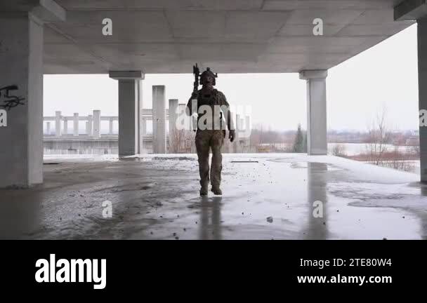 Special forces operator wearing Multicam uniform and his assault rifle ...