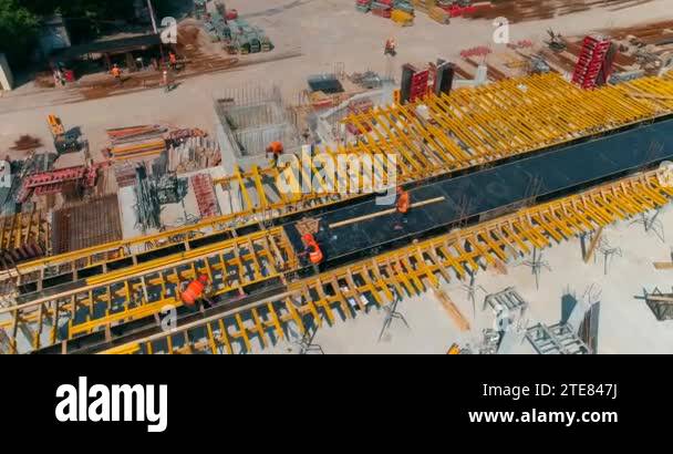 Construction process of a modern football stadium. Builders make ...