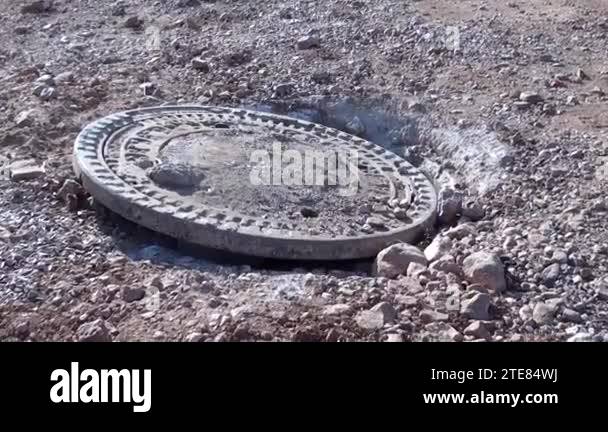 Steel manhole cover Stock Videos & Footage - HD and 4K Video Clips - Alamy