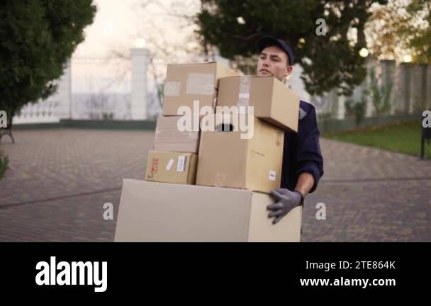 Man carrying heavy load boxes Stock Videos & Footage - HD and 4K Video ...