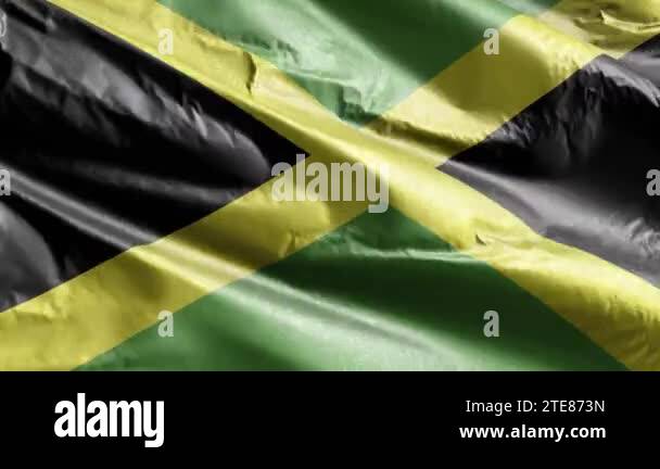 Jamaica textile flag waving on the wind loop. Jamaican banner swaying ...