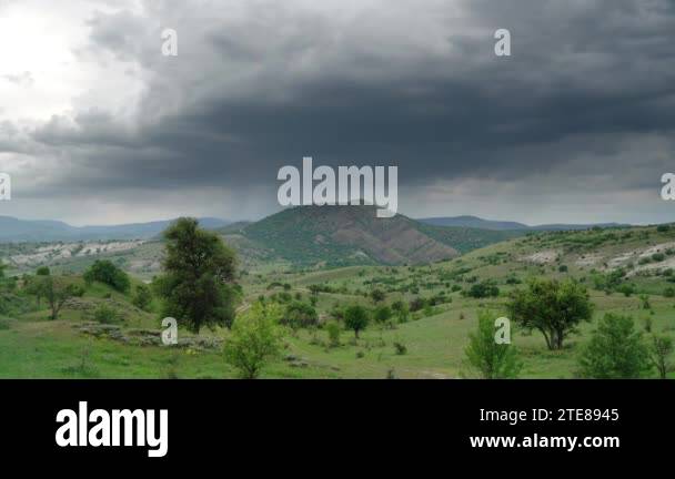 8K 7680X4320 4320p.Storm clouds over meadow moorland.Dark stormy cloud ...