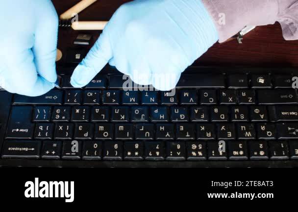 A professional computer technician uses the correct movements to remove ...