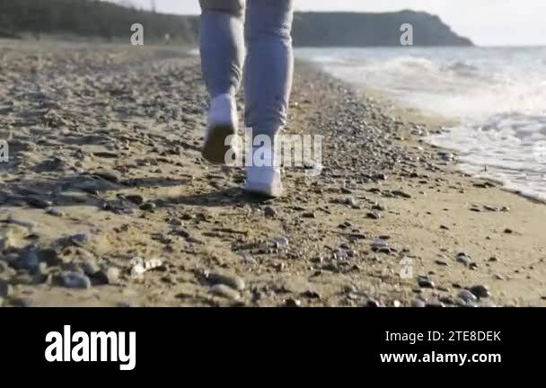 Dodging waves beach Stock Videos & Footage - HD and 4K Video Clips - Alamy