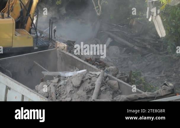 Demolition of ancient historical buildings, excavator breaks down ...