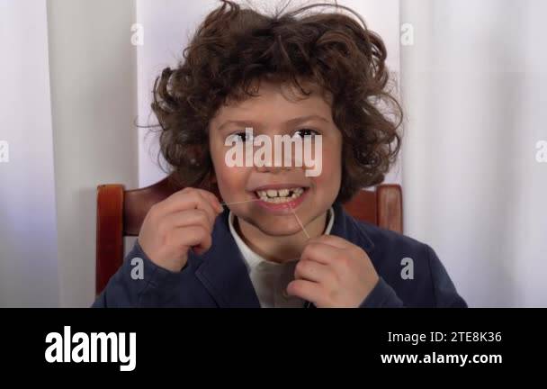 Boy flossing teeth Stock Videos & Footage - HD and 4K Video Clips - Alamy