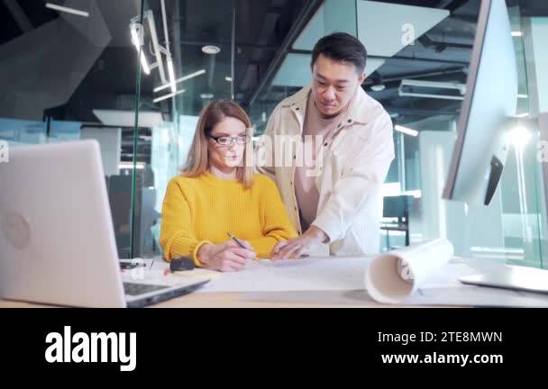 Crew multiracial team of creative people discussing a project. Mixed raced office engineers ...