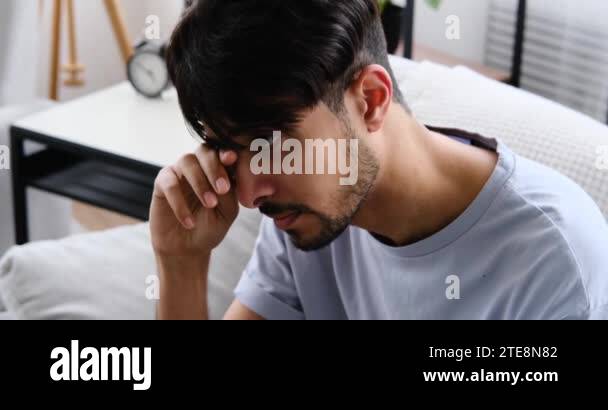 Sad crying man suffering with depression Stock Video Footage - Alamy