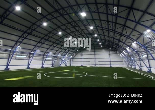 Indoor football field with white marking and gate at stadium Stock ...