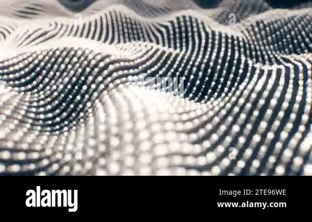 Abstract morphing waves glowing surface made by white dot trails ...