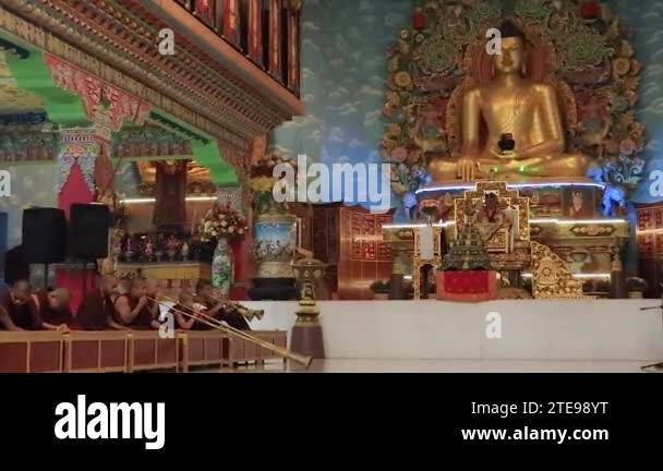 huge golden buddha statue at buddhist monastery from flat angle video ...