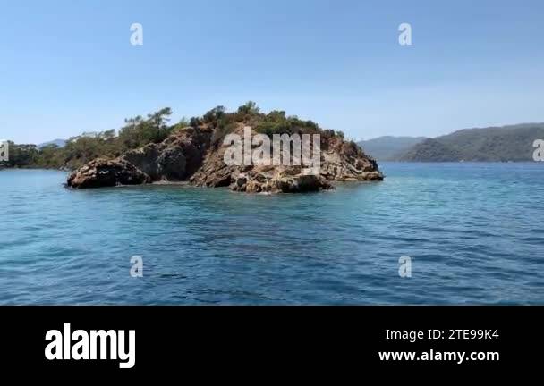 The flow of water overboard a seagoing vessel. Splashes and movement of ...