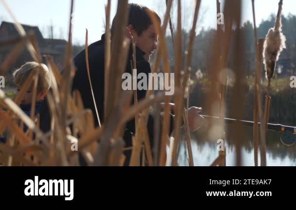Fisherman Fishing Rod Fisher. Father and Child Kid Rest near Lake Pond ...