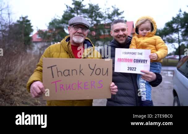 Family holding signs Stock Videos & Footage - HD and 4K Video Clips - Alamy