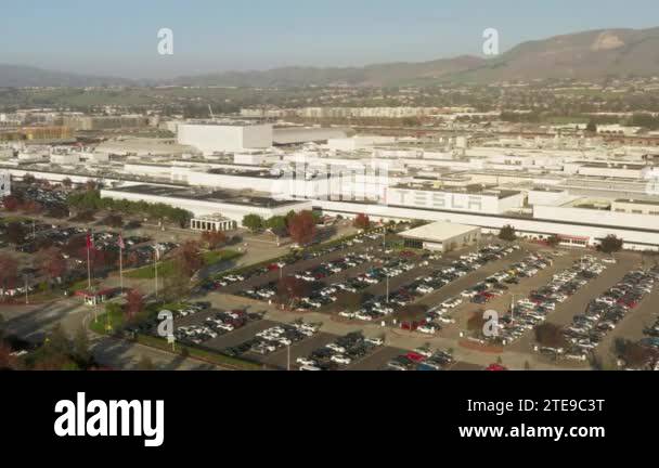 Panorama main entrance and parking lot at Tesla electric vehicle ...