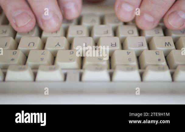 Close Up Shooting with a Keyboard and a Computer Programmer Typing a Code Line on Pc. Hands ...