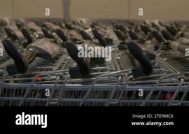 Shop cart handles. Location of infection. The carts are stacked in a ...