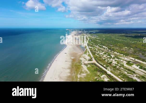 Northeast Brazil. Aeolian turbine at Beach at Ceara state. Beach with ...