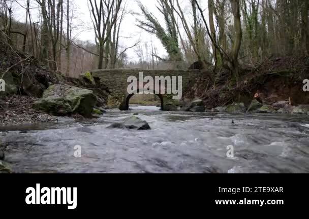 Damaged bridge shows broken bridge after heavy rainfall and extreme ...