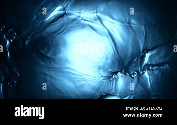 Super slow motion of mixing water surface in wavy shapes. Filmed on ...