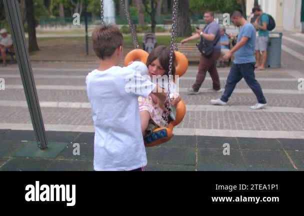 Helping playground children Stock Videos & Footage - HD and 4K Video ...