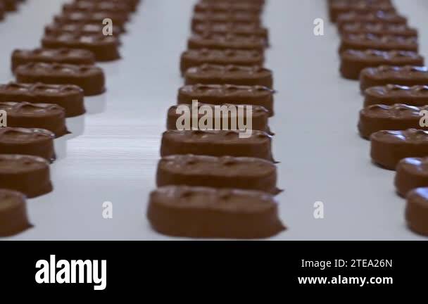 Conveyor with passing chocolate bars. Chocolate Factory Stock Video ...