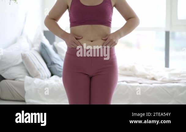 Abdominal massage, tummy tuck and flabby skin on a fat belly, woman ...