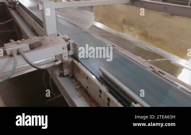 Furniture board production process. Automated conveyor belt at a ...
