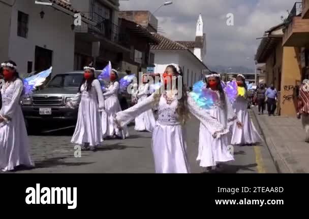 Cuenca, Ecuador, Dec 24, 2021 - 10 Angels dance in a Christmas parade ...