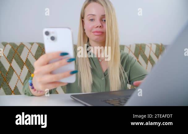 Beautiful woman with one prosthetic eye and scars using mobile phone ...